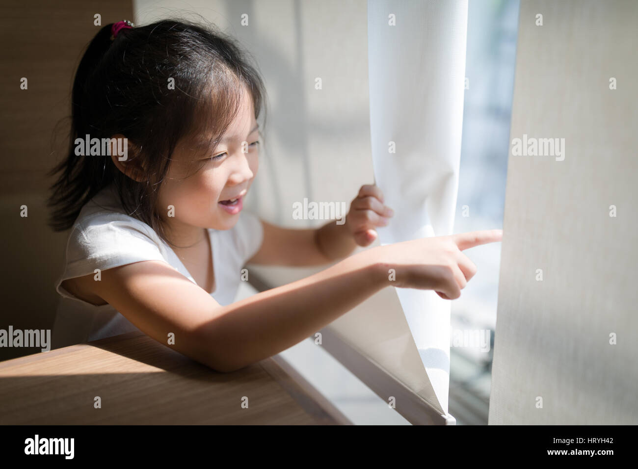 Concept of exploring illustrated by Asian child pointing out and ...