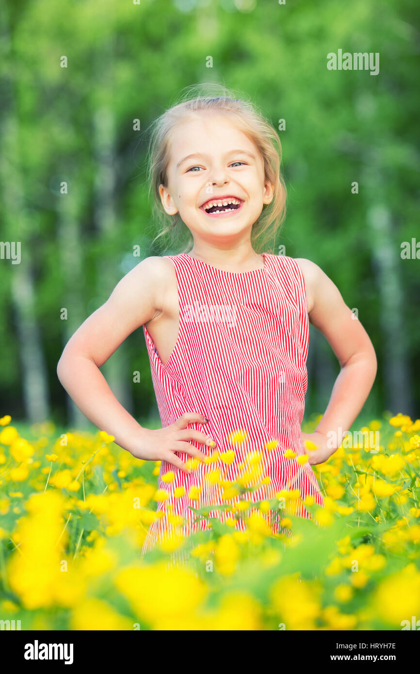 Laughing blond little girl hi-res stock photography and images - Alamy