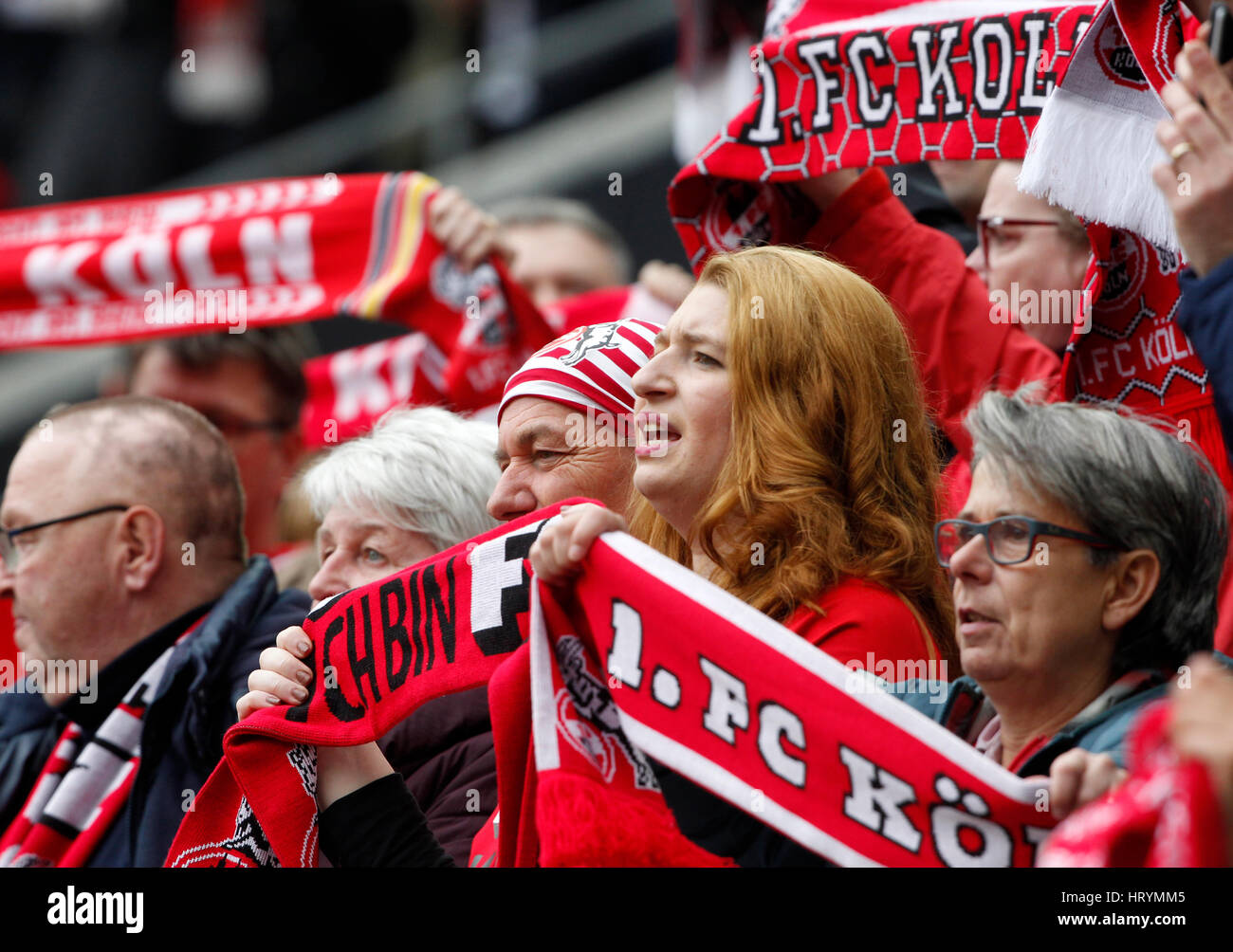 Cologne's fans celebrate their team during the German Bundesliga soccer ...