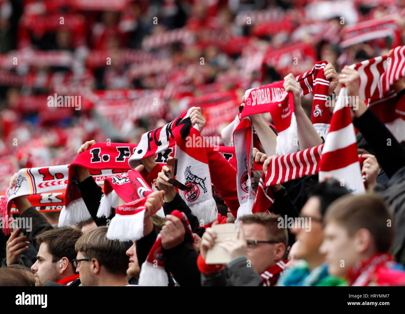 Cologne's fans celebrate their team during the German Bundesliga soccer ...