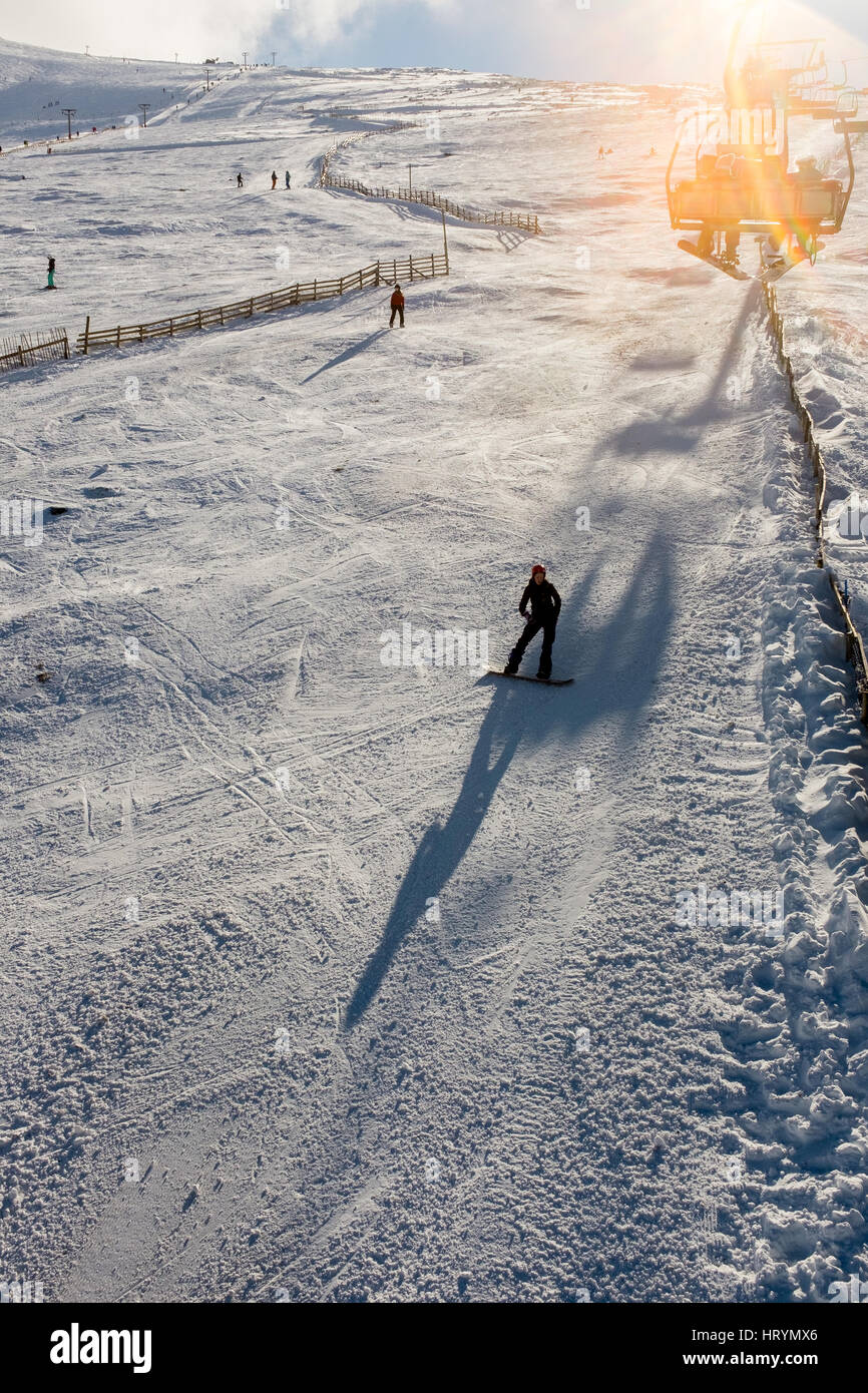 Nevis range chair lift sunshine snowboarders hi-res stock photography ...