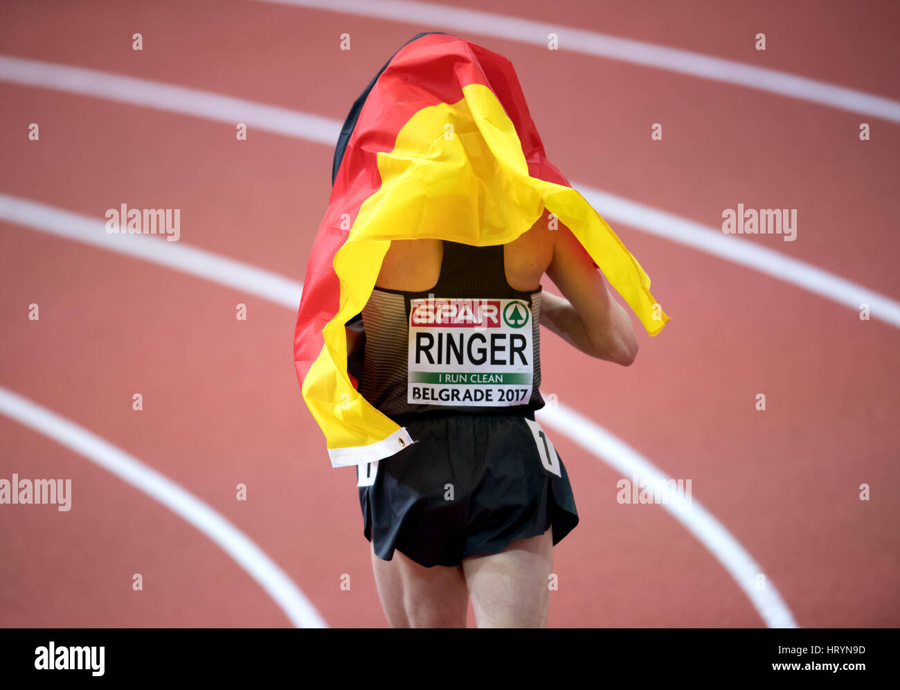 Richard Ringer from Germany (bronze) celebrates after the 3,000 m race ...