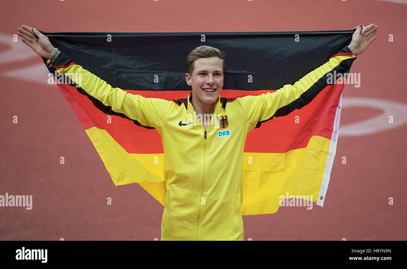 Max Hess from Germany (bronze) celebrates after the triple jump event ...