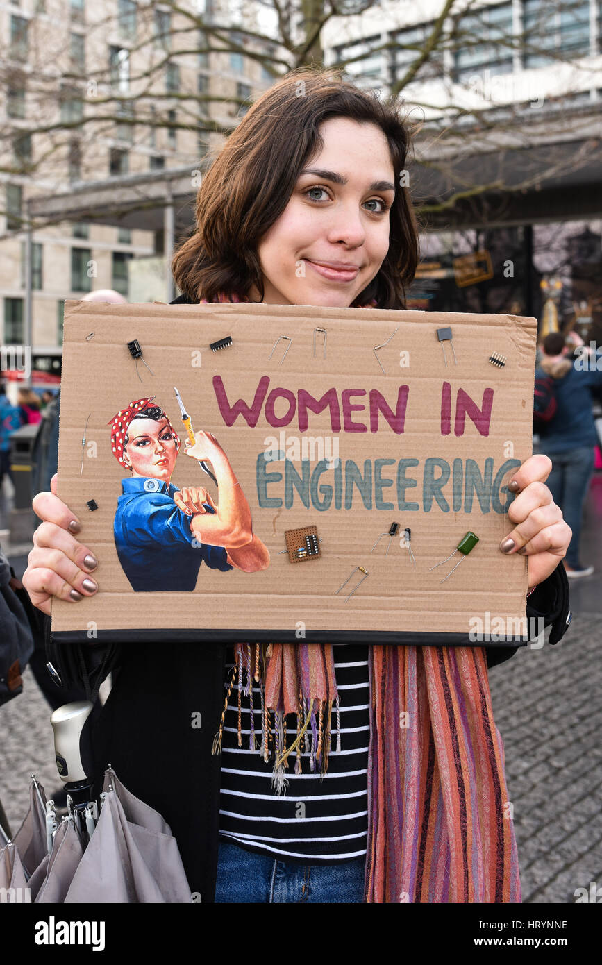 London, UK. 5th Mar, 2017. A protester holds 'Women in Engineering ...