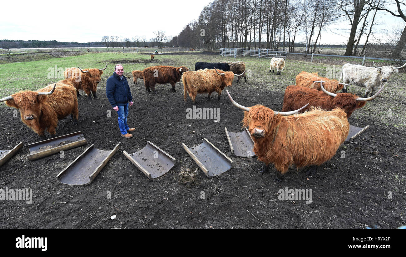 Fuhrberg, Germany. 28th Feb, 2017. Farmer Henning Warnecke stands ...