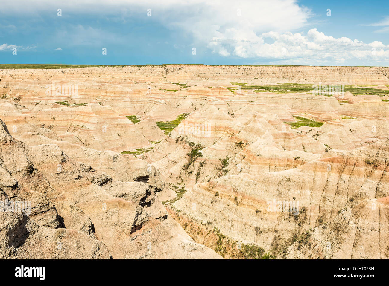 Badlands red canyons in South Dakota with storm cloud Stock Photo - Alamy