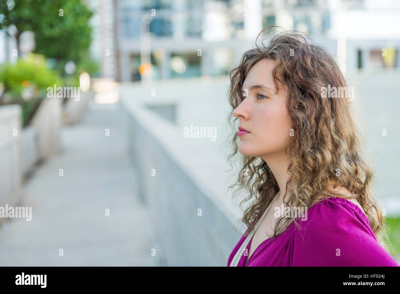 Side profile portrait of woman in urban city in Chicago Stock Photo - Alamy