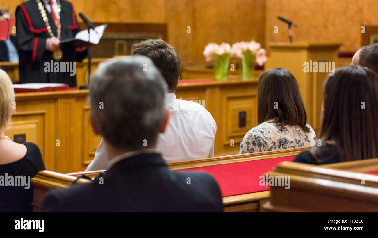 Audience at a official ceremony Stock Photo - Alamy