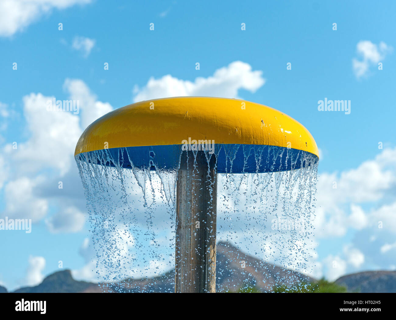 Decorative mushroom with shower in the water park Stock Photo - Alamy