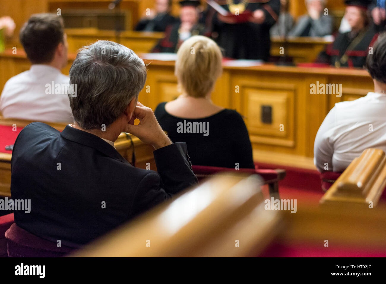 Audience at a official ceremony Stock Photo - Alamy