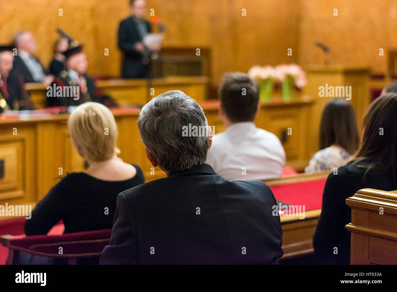 Audience at a official ceremony Stock Photo - Alamy