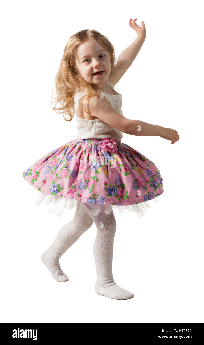 Cute three-year girl is jumping, running, dancing, laughing. Her hair ...