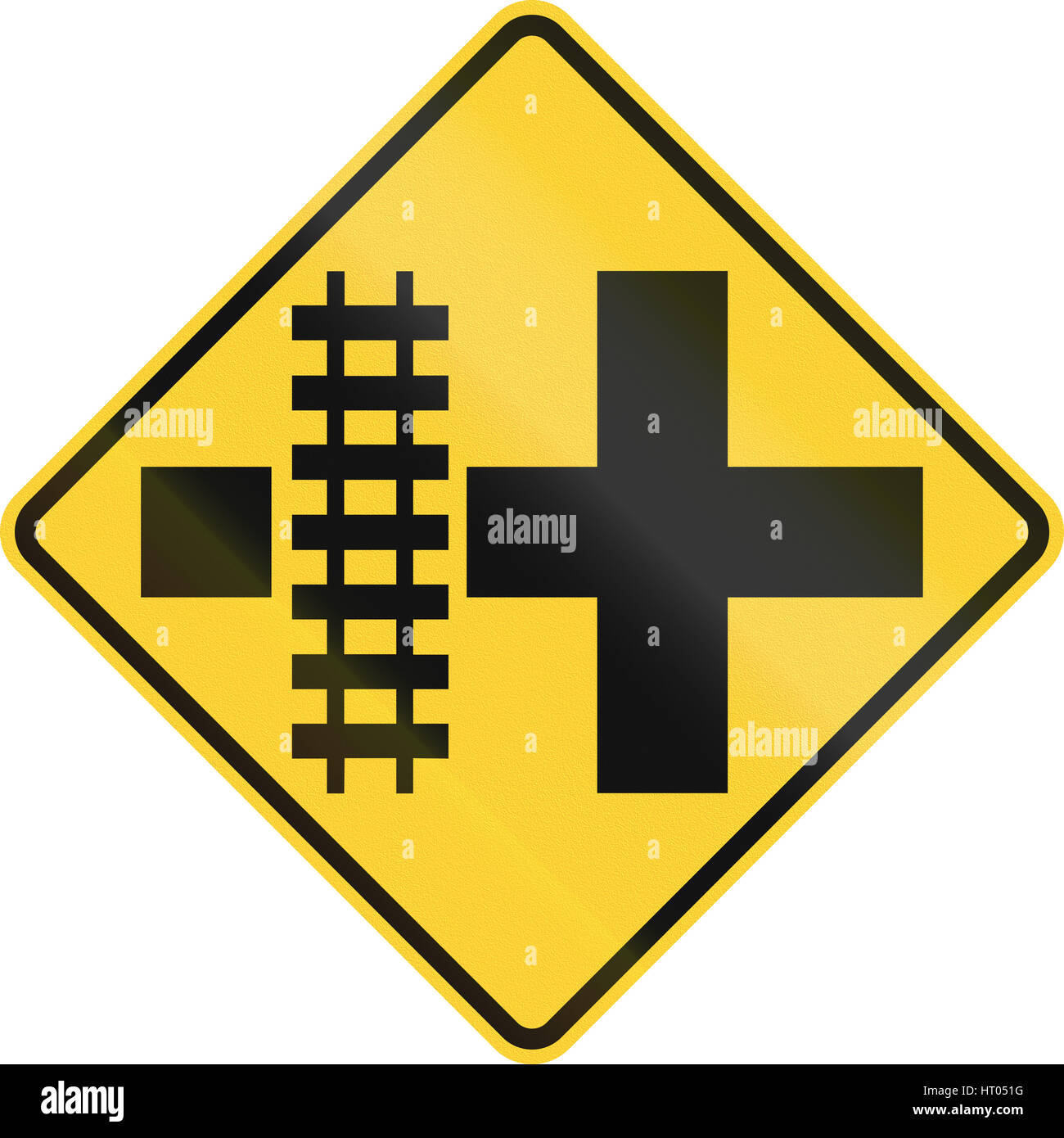 United States MUTCD road sign - Level crossing and intersection Stock ...