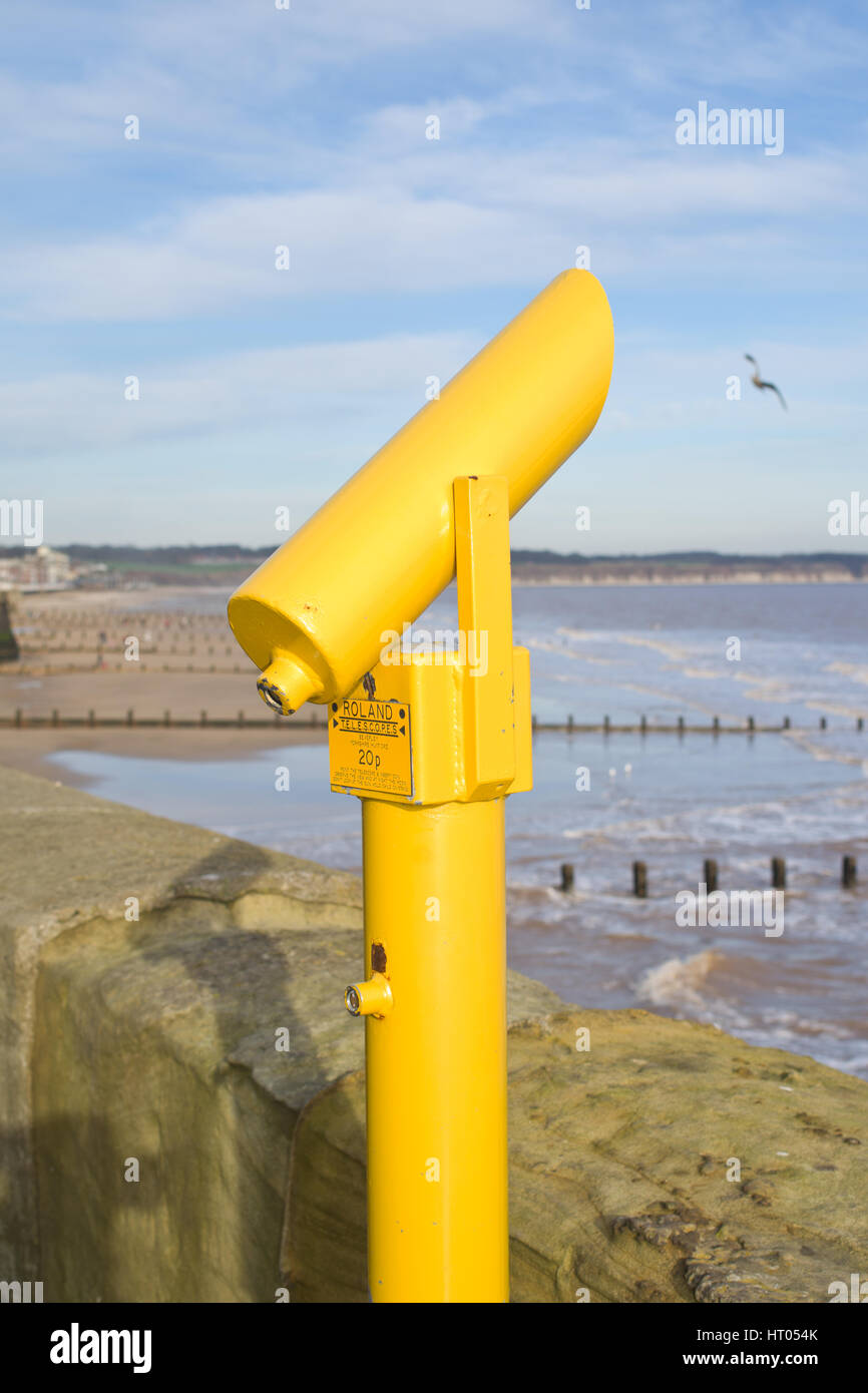 Bright Yellow Seaside Telescope Stock Photo - Alamy