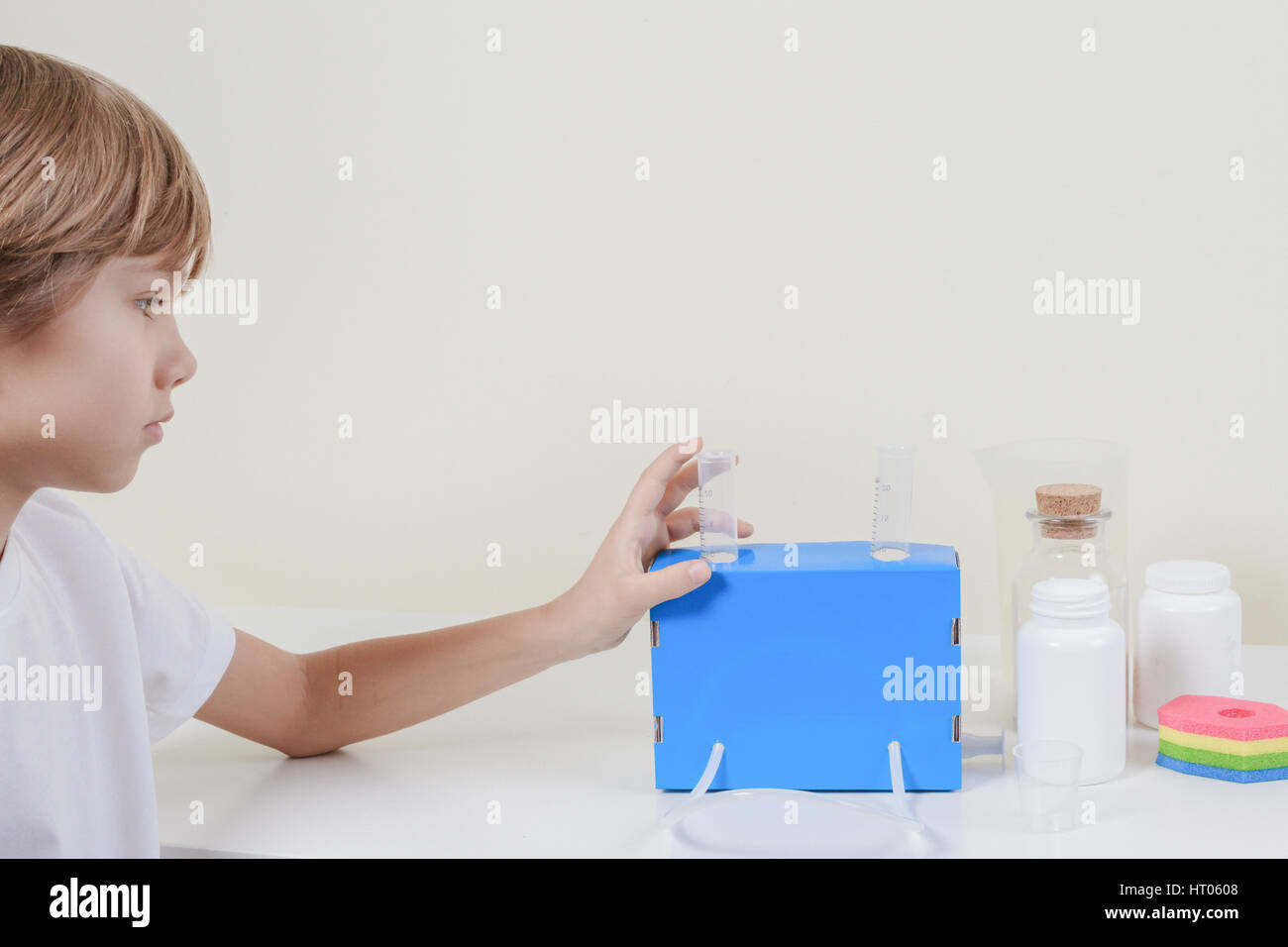 Young boy making science experiments. Education concept Stock Photo - Alamy