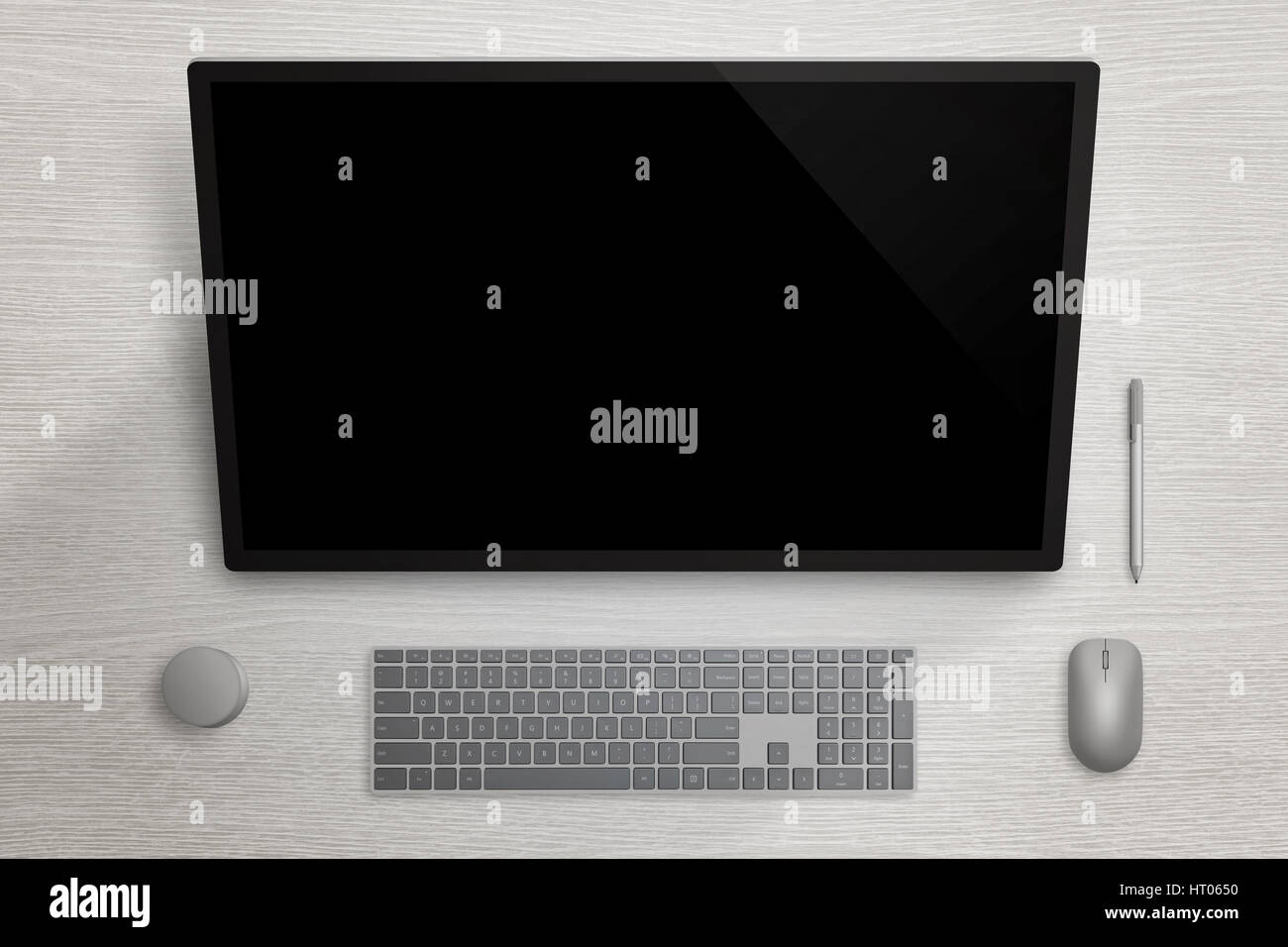 Big touch screen display on gray surface board. Pen, mouse, keyboard ...