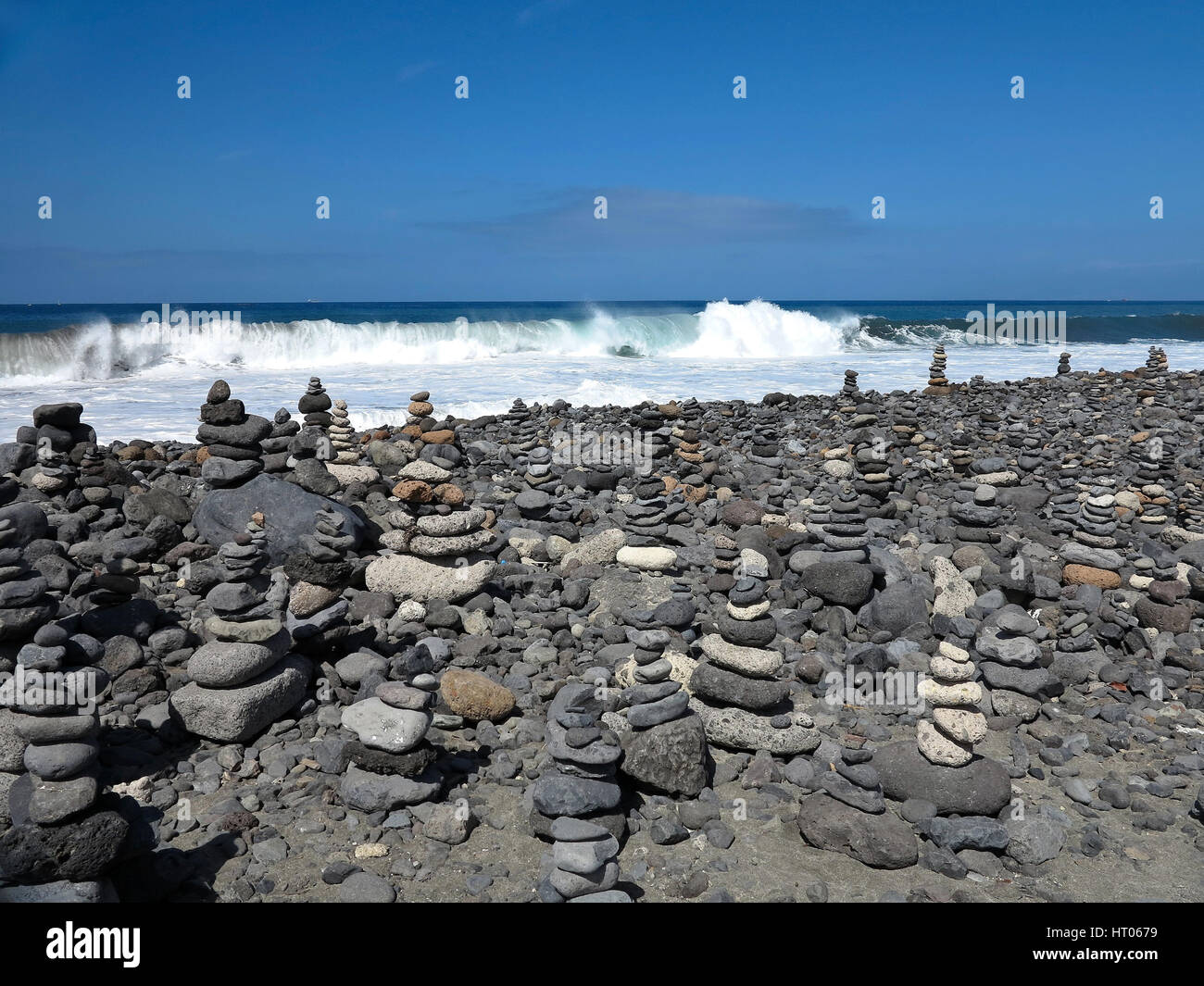 Pyramids balanced stones on beach hi-res stock photography and images ...