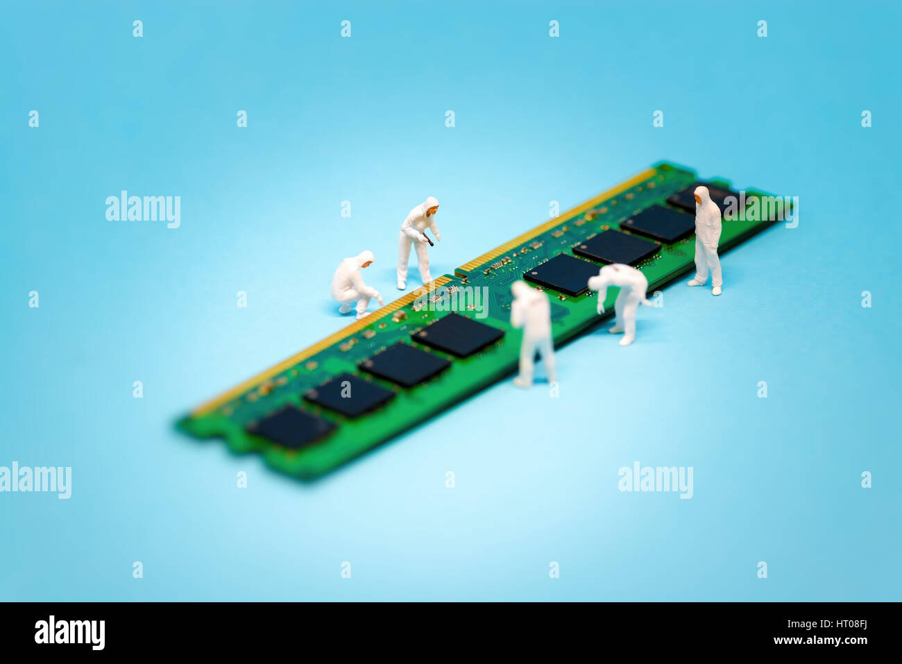 Miniature technicians repairing computer RAM module. Macro photo Stock ...