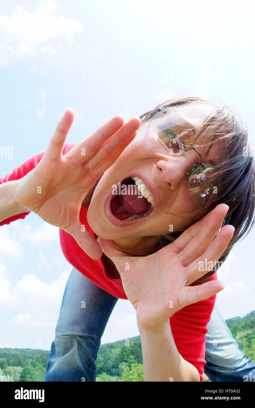 Frau ruft - woman calling Stock Photo - Alamy