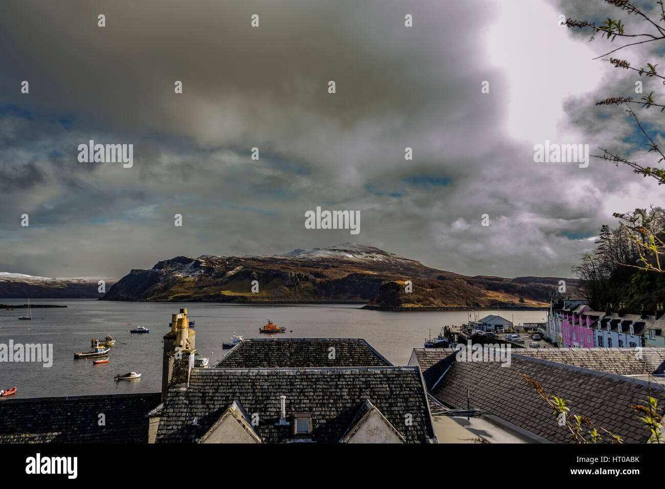 Ben Tianavaig and Sound of Raasay across Portree Harbour, on the Isle ...