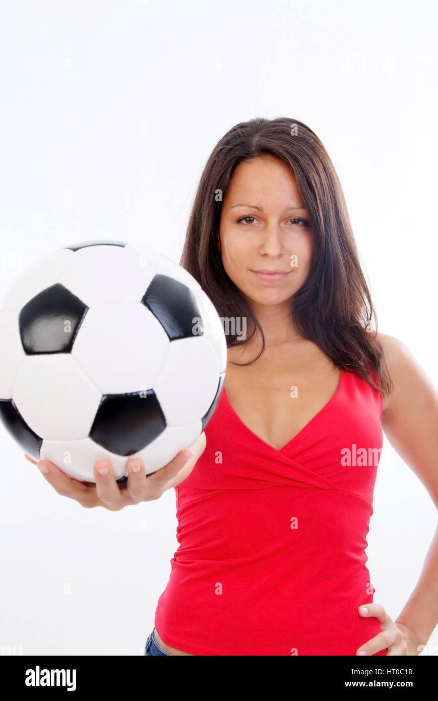 Junge Frau mit Fu?ball - young woman with soccer ball Stock Photo - Alamy