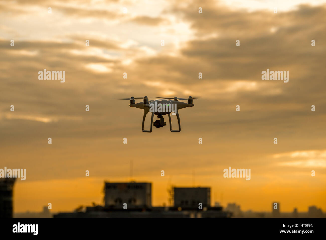 Drone flying over skyscraper building hi-res stock photography and ...