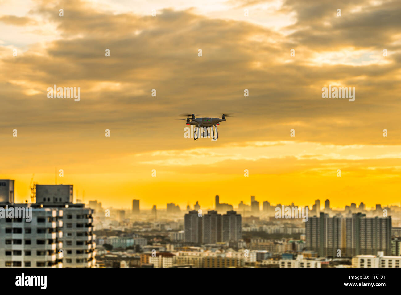 Drone flying over skyscraper building hi-res stock photography and ...