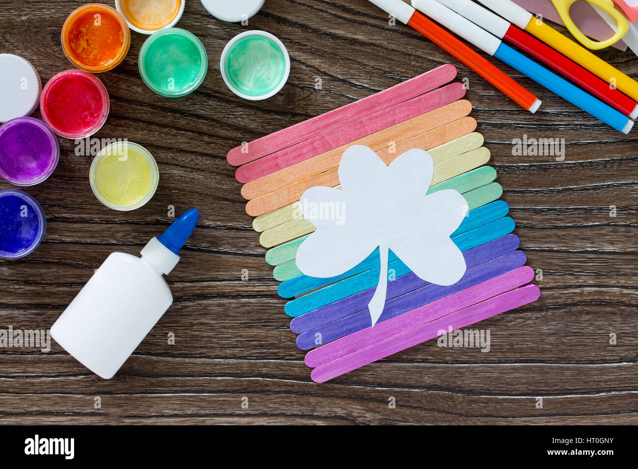 St. Patrick's Day clover on a rainbow, a craft of of wooden sticks ...