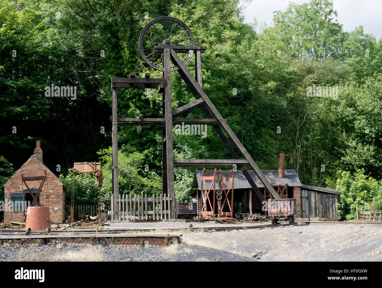 Pithead wheel above a mineshaft Stock Photo - Alamy