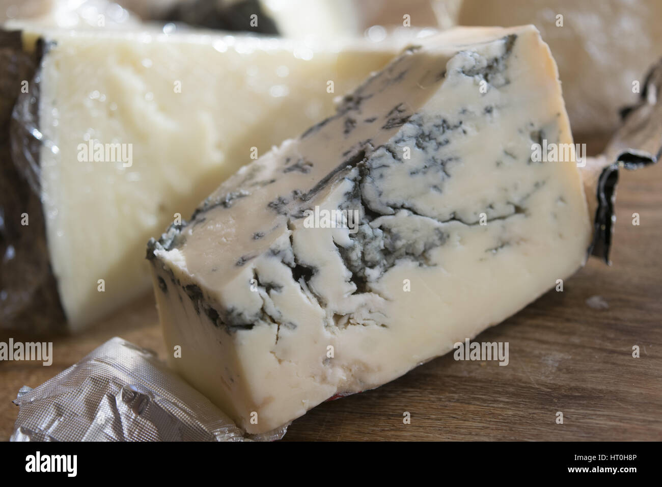detail of a piece of french roquefort cheese Stock Photo - Alamy