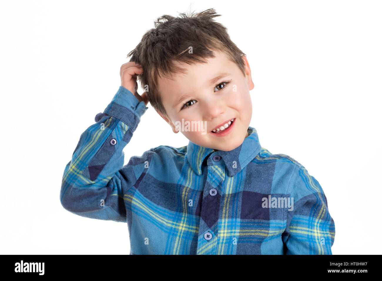 Little boy scratching his head. Isolated on a white background Stock ...