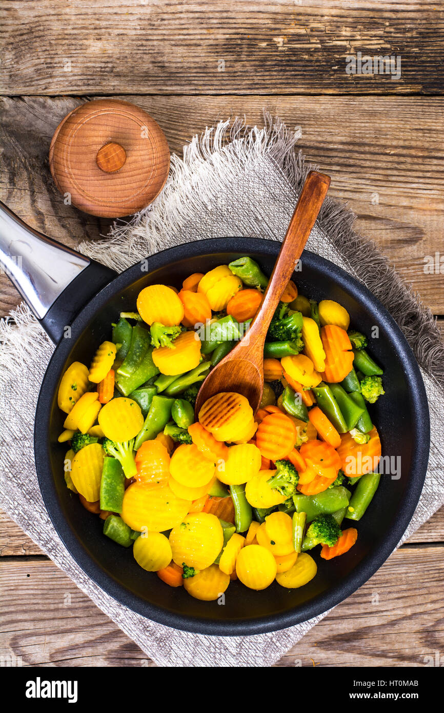 Vegetables in frying pan, top view Stock Photo - Alamy