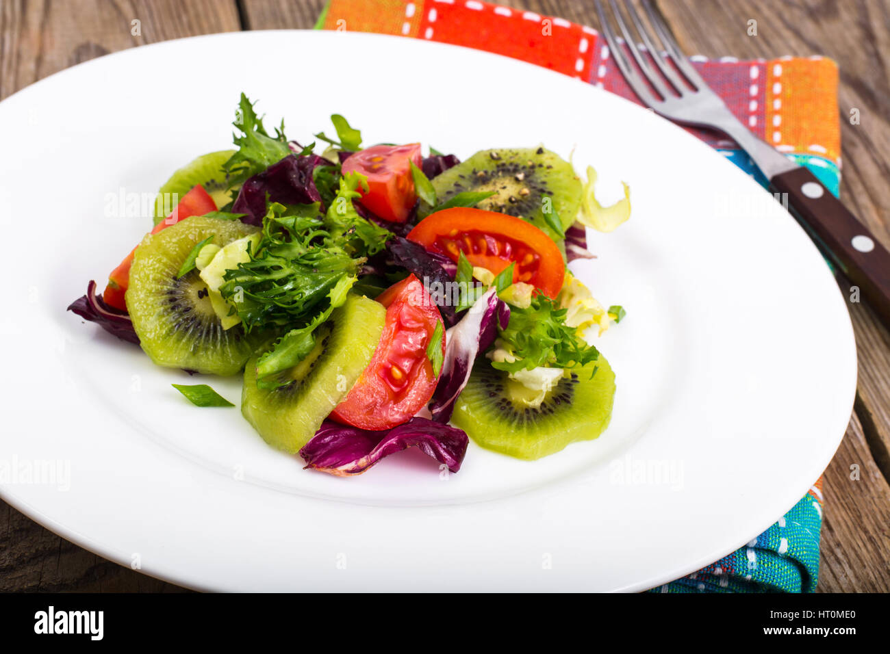 Healthy food mix of lettuce with tomatoes Stock Photo - Alamy