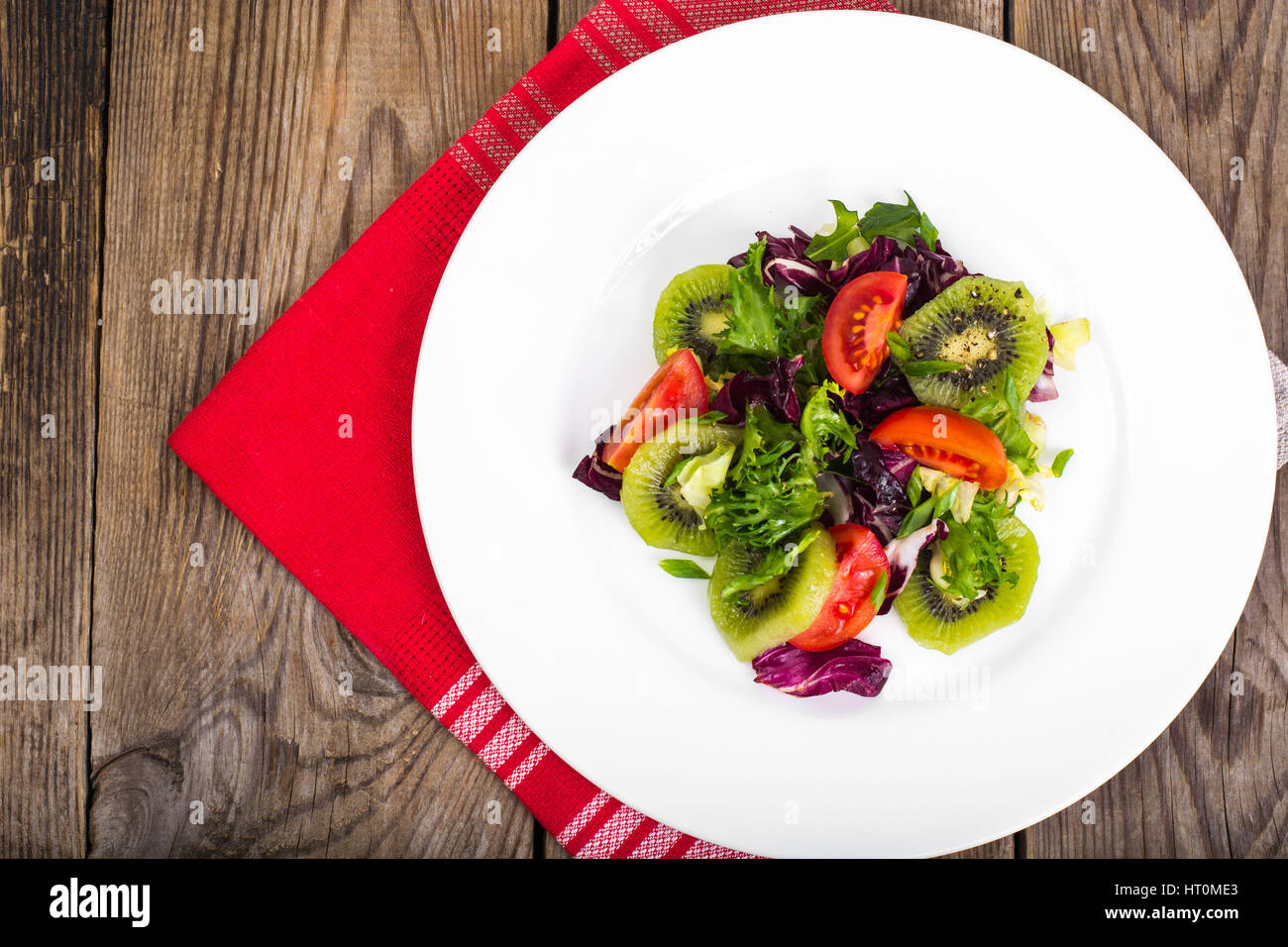 Healthy food mix of lettuce with tomatoes Stock Photo - Alamy