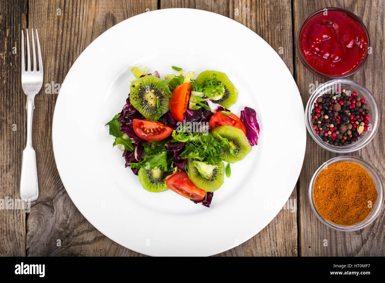 Healthy food mix of lettuce with tomatoes Stock Photo - Alamy