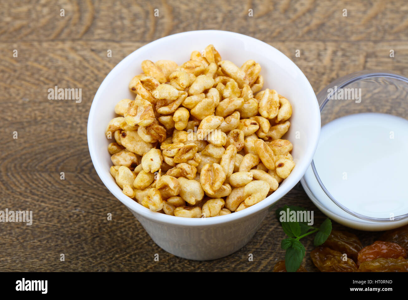Rise flakes with milk, raisin and mint leaves Stock Photo - Alamy