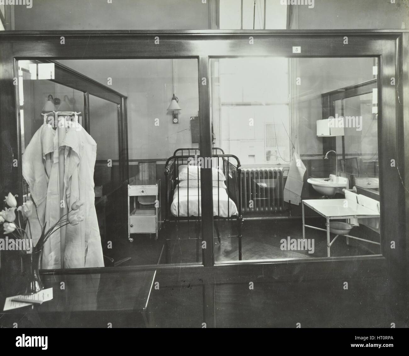 An isolation chamber, Brook General Hospital, London, 1935. Artist ...