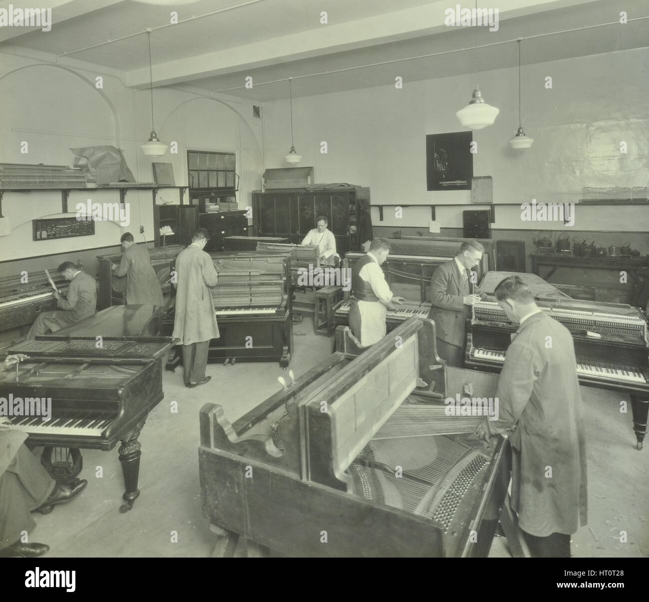 Piano repairing class, Northern Polytechnic, London, 1930. Artist ...