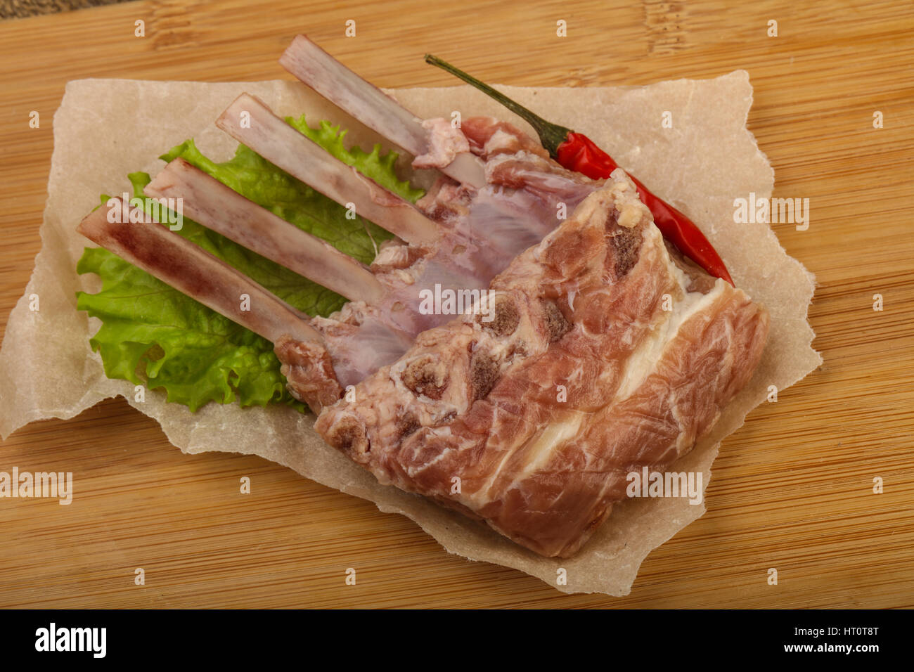 Raw lamb ribs with pepper ready for cooking Stock Photo - Alamy