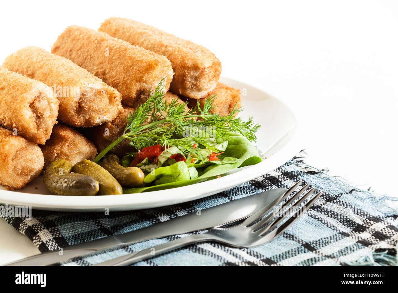 Delicious croquettes with meat and vegetable salad Stock Photo - Alamy