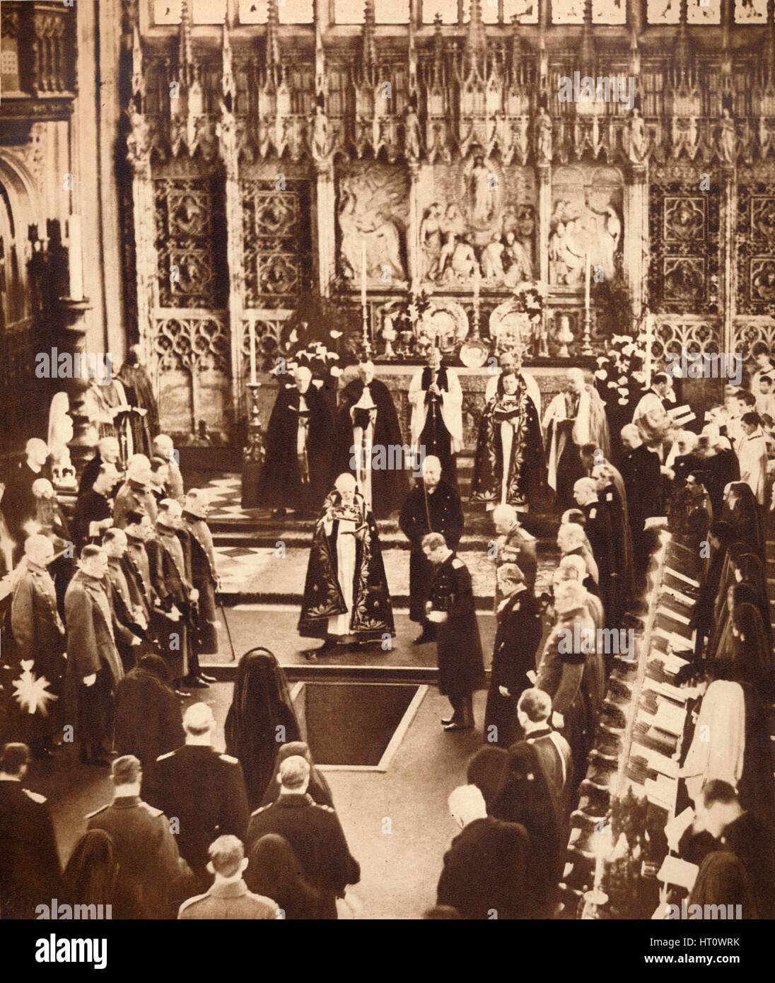 King Edward VIII sprinkles earth on his father's coffin, 1936. Artist ...