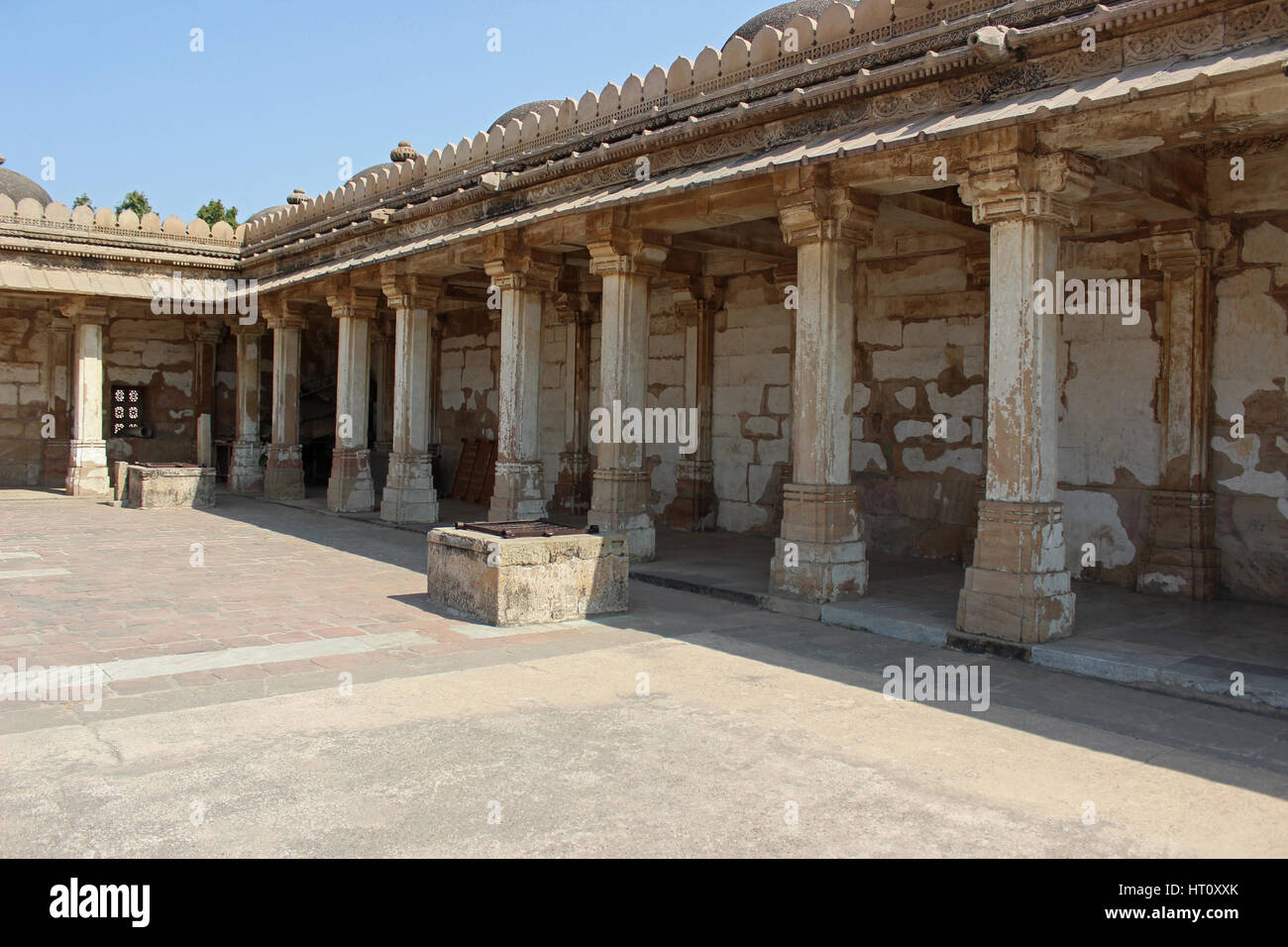 Colonnaded cloister of historic Tomb at Gujarat at Sarkhej Roza mosque ...