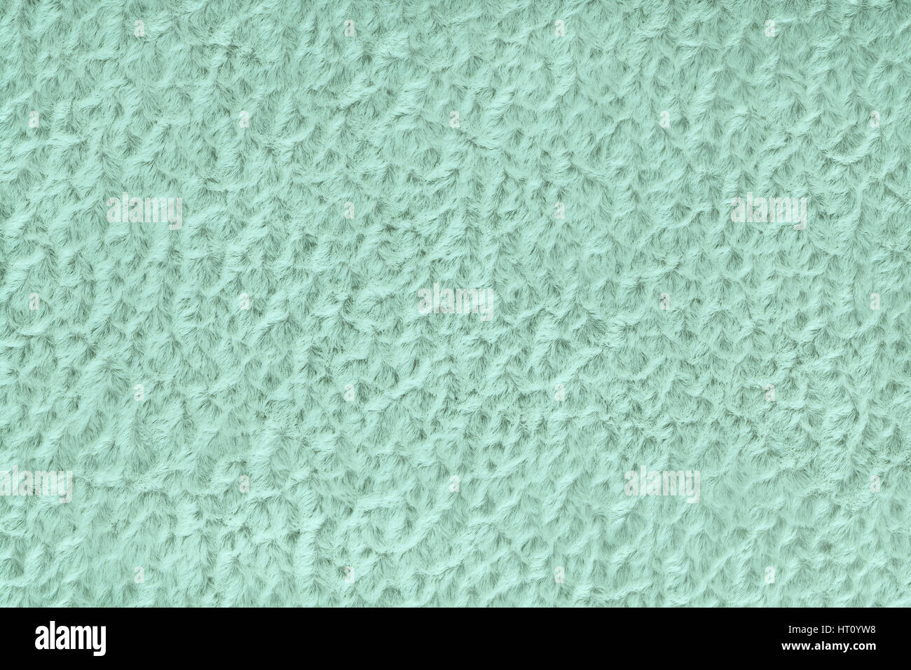 Light green fluffy background of soft, fleecy cloth. Texture of textile ...