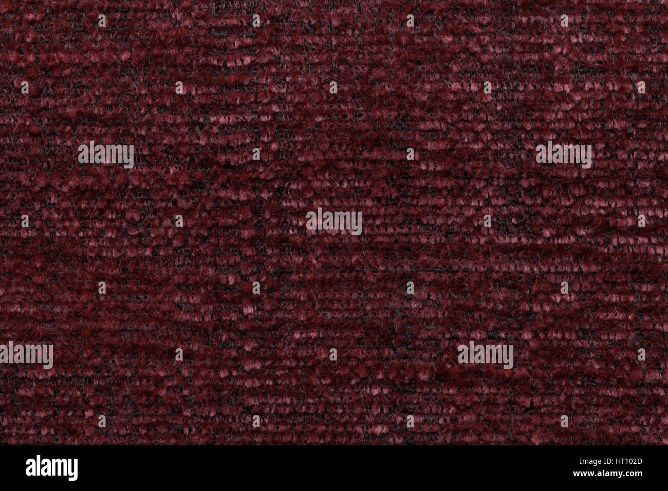Dark red background of soft, fleecy cloth. Texture of textile closeup ...