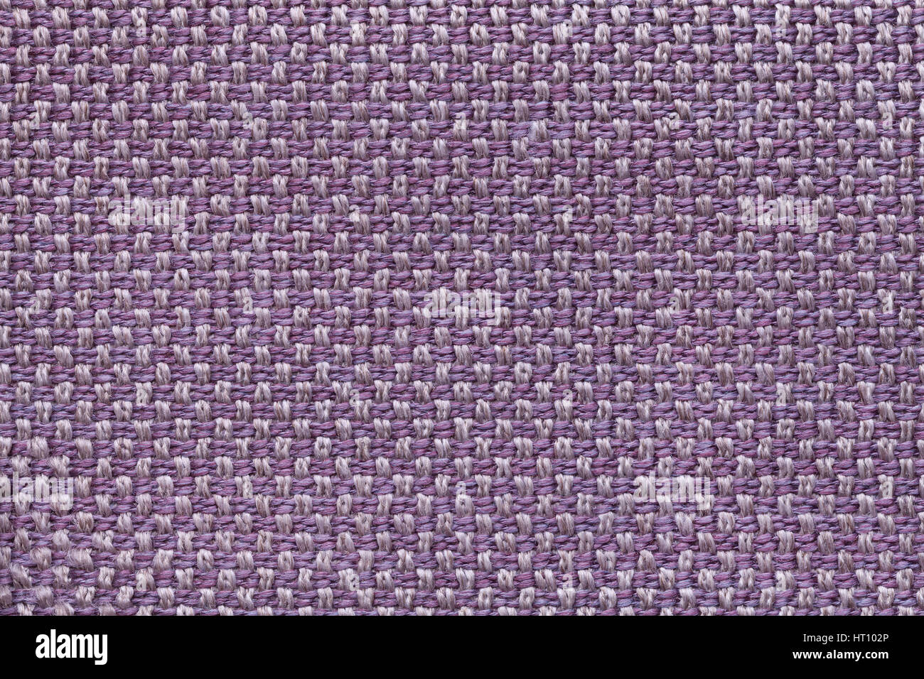 Light purple background with checkered pattern, closeup. Structure of ...
