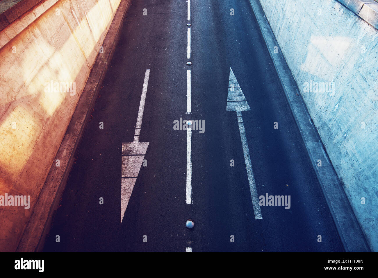 Aerial view of empty two lane road with opposite direction arrows Stock ...