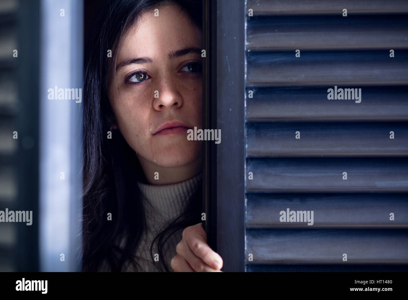 Woman opening door sad hi-res stock photography and images - Alamy