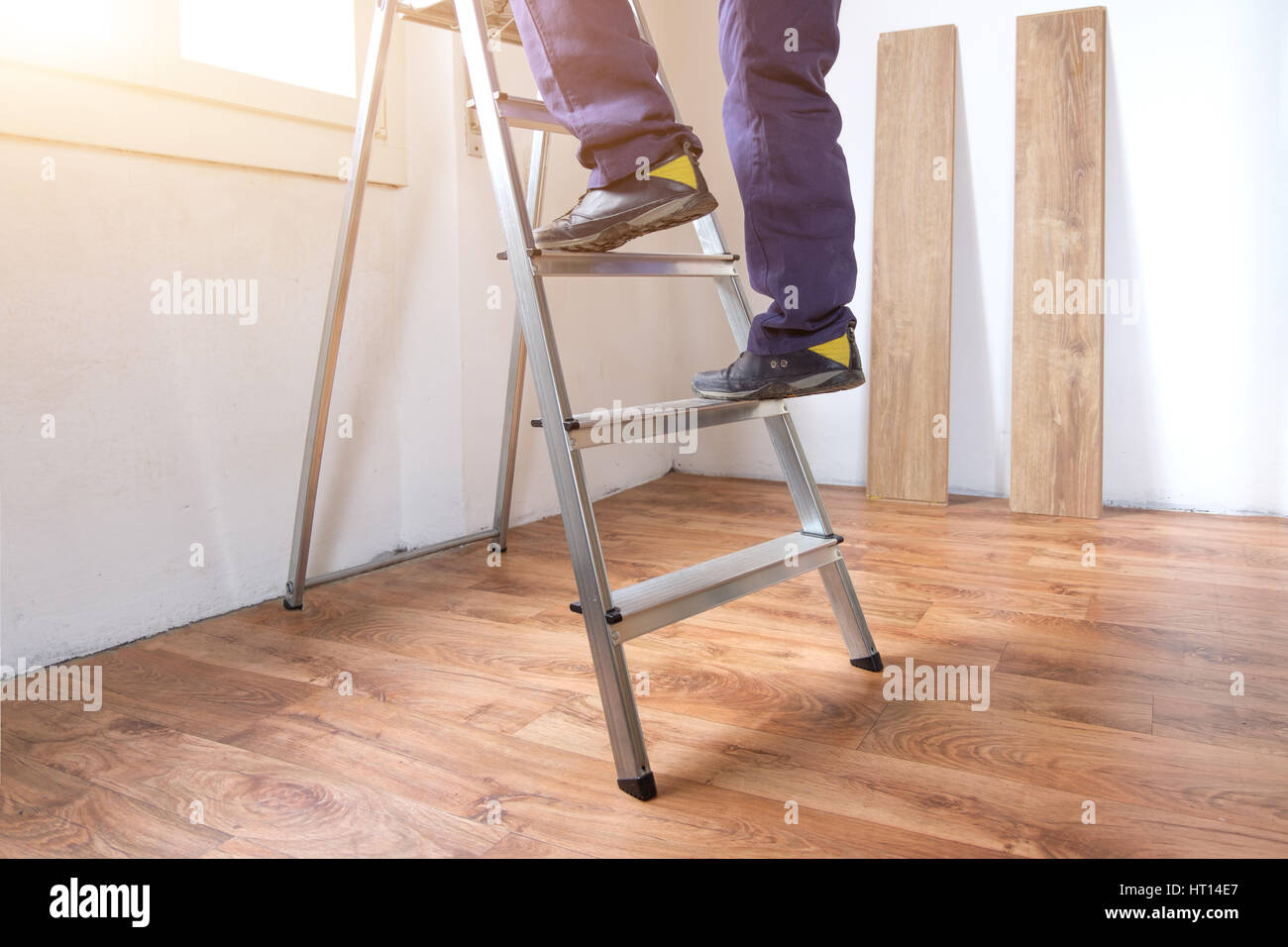 Foot on ladder hi-res stock photography and images - Alamy