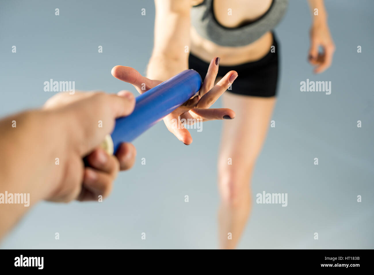 Passing the baton hi-res stock photography and images - Alamy