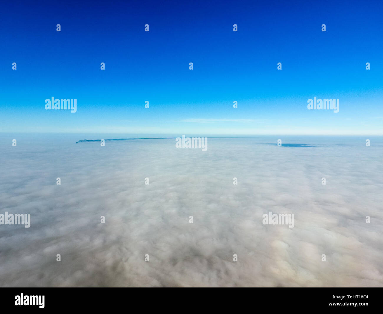 In the skies above the fog. Sunrise over the fog. Clouds near the ...